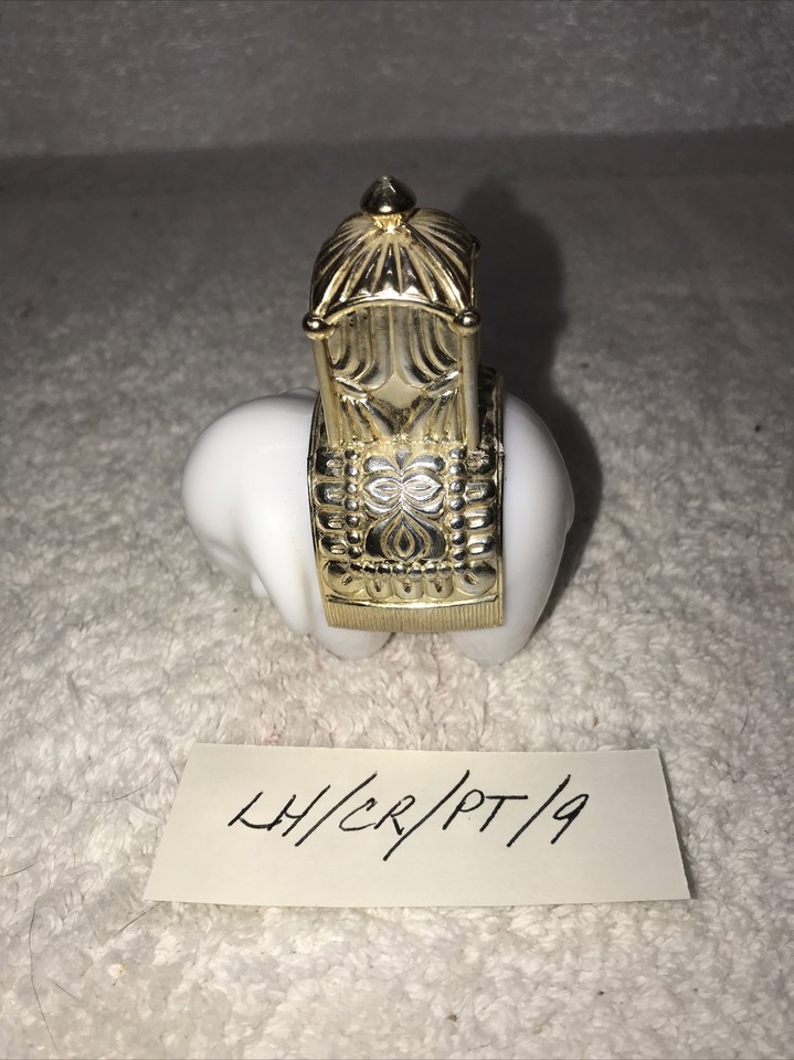 Vintage Avon White Royal Elephant Topaz Cologne. 32287 still full no ...