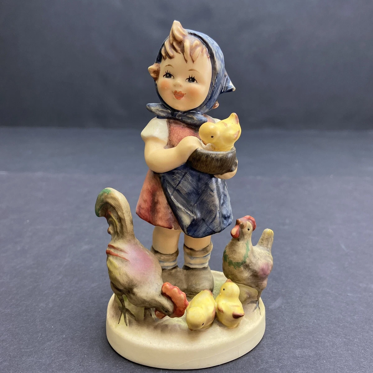 high-quality guaranteed Hummel Figurine - Girl Feeding Chicks