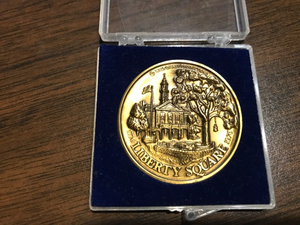 Coin from Walt Disney World Liberty Square Gold-colored w/case | eBay