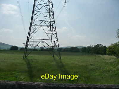 Photo 6x4 East Devon : Field & Pylons Huxham Pylons heading through a ...