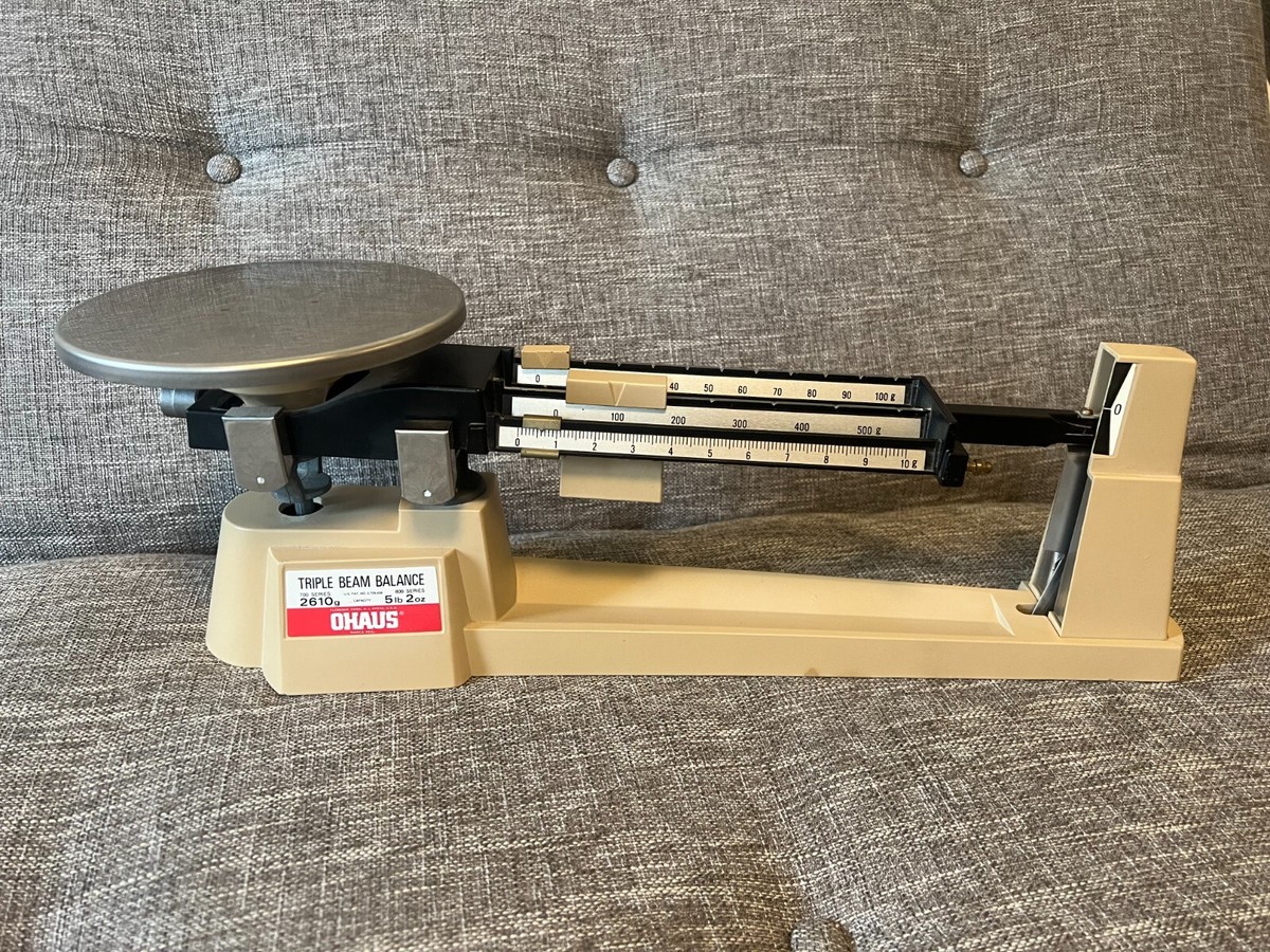 Triple Beam Balance With Student