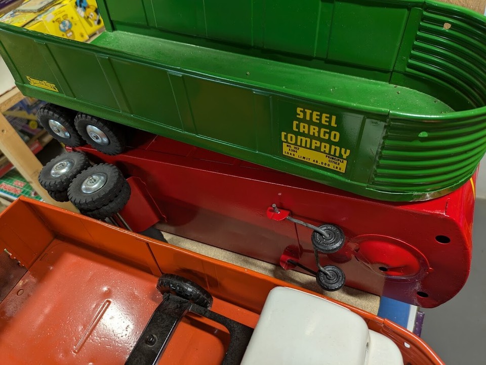 Structo Construction truck with three trailers. (Green has no rear gate ...