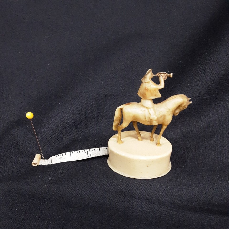 RARE Vintage Celluloid Sewing Tape Measure ....SOLDIER ON HORSE BLOWING ...
