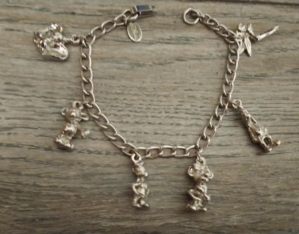 Walt Disney Characters Charm Bracelet tagged Mickey Mini Mouse Dumbo ...