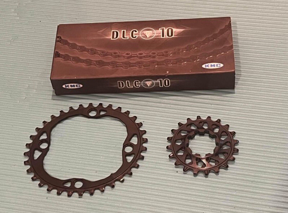 Brand new single speed mountain bike KMC chain + Absolute Black cog ...