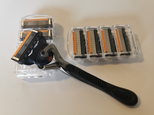 Gillete Pro flide Fusion used a few times only. 7 new cartridges and ...