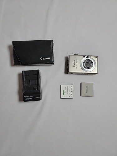Canon PowerShot ELPH SD600 6.0MP Digital Camera w/ Charger + 2 ...