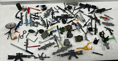 MIXED LOT OF ACTION FIGURE GUNS, WEAPONS, MISSILES, SWORDS ...