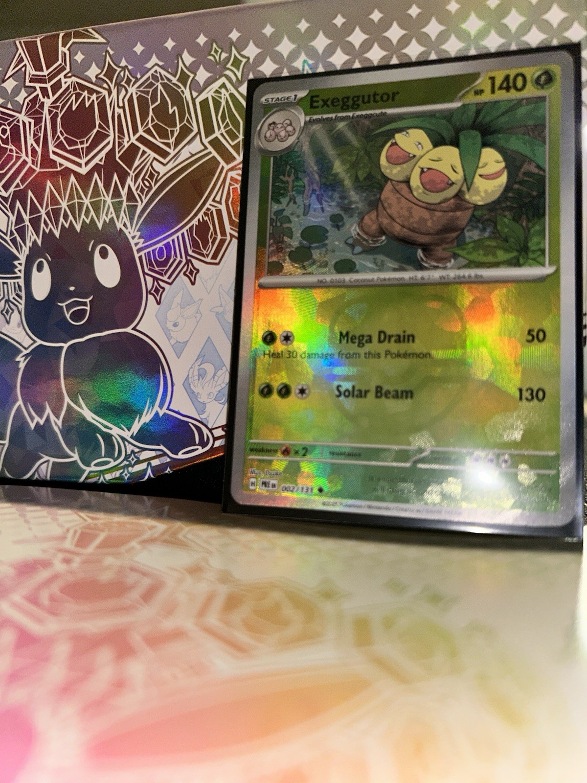 Exeggutor [Master Ball Holo] | Pokémon Prismatic Evolution | Card# 002/ ...