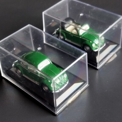 Hongwell model cars. 2 VW Beetles .Size 1:75 . 6.5 cm.Unused.Cased ...
