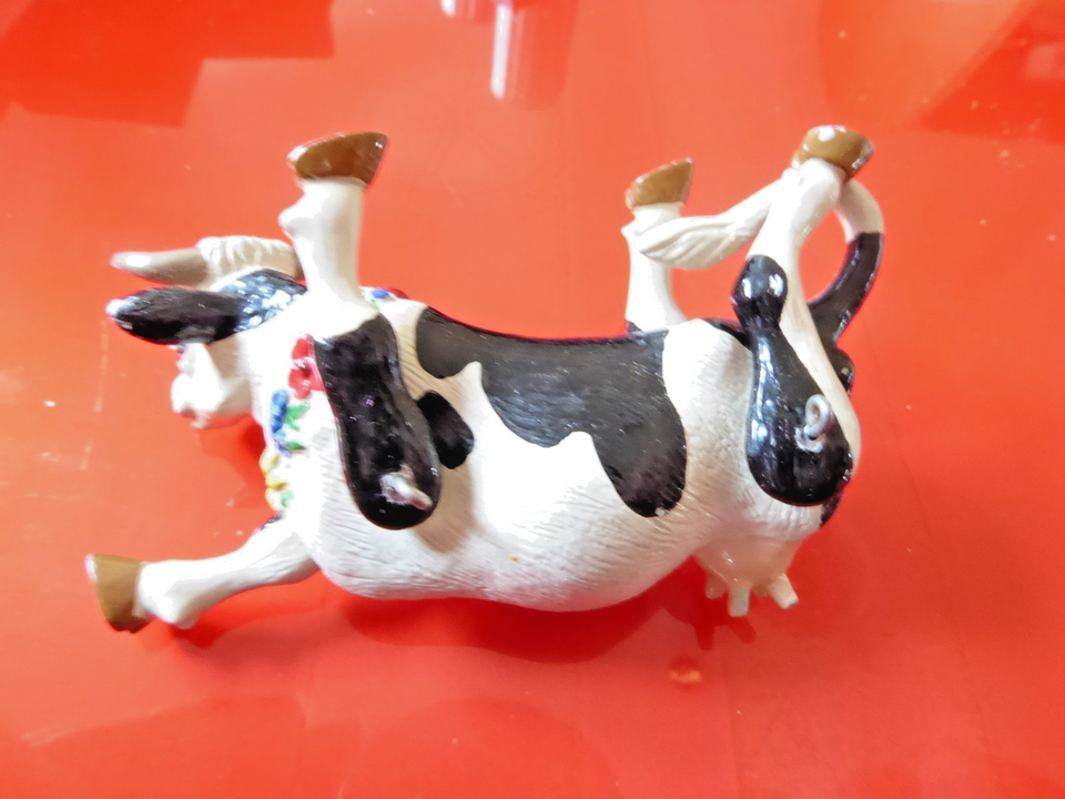 Cold painted bronze, articulated cow, that doubles as a contortionist ...