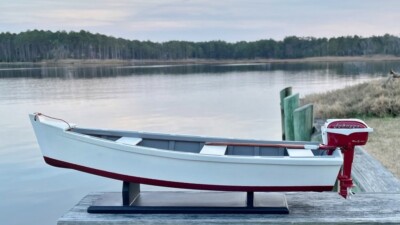 WOODEN SKIFF MODEL, WITH MINIATURE RED JOHNSON OUTBOARD, FOR CRABBING ...