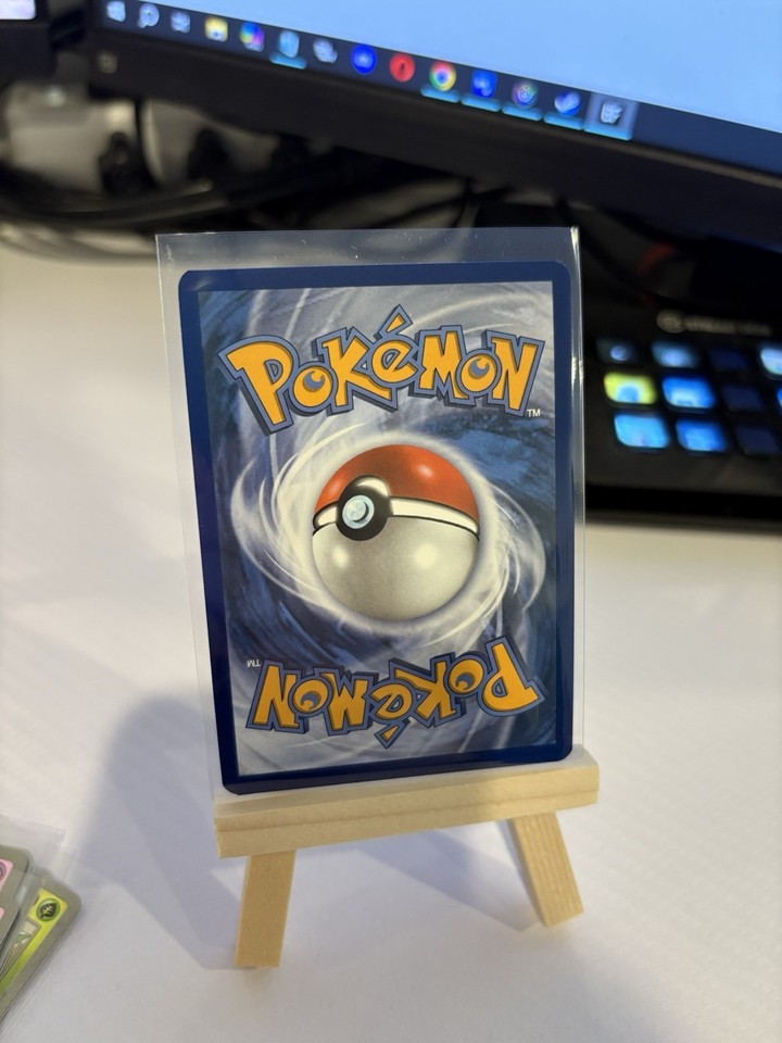 Umbreon 059/131 Cosmos Galaxy Holo Prismatic Evolutions Mini Tin Costco ...