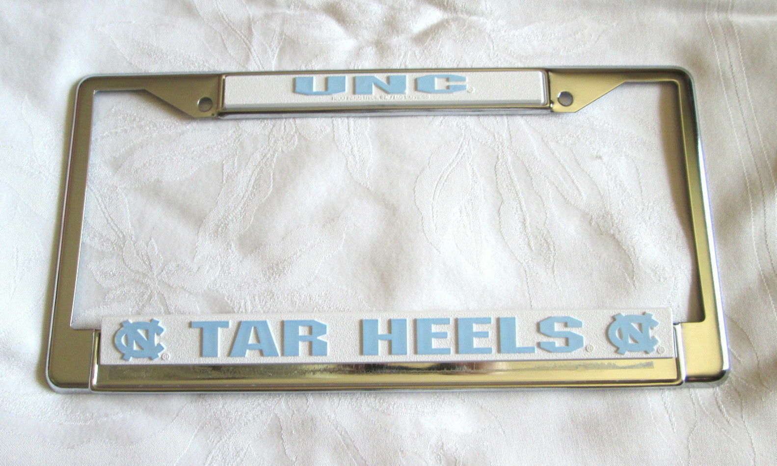 NORTH CAROLINA TARHEELS EMBOSSED CHROME LICENSE PLATE FRAME #02a - NEW ...
