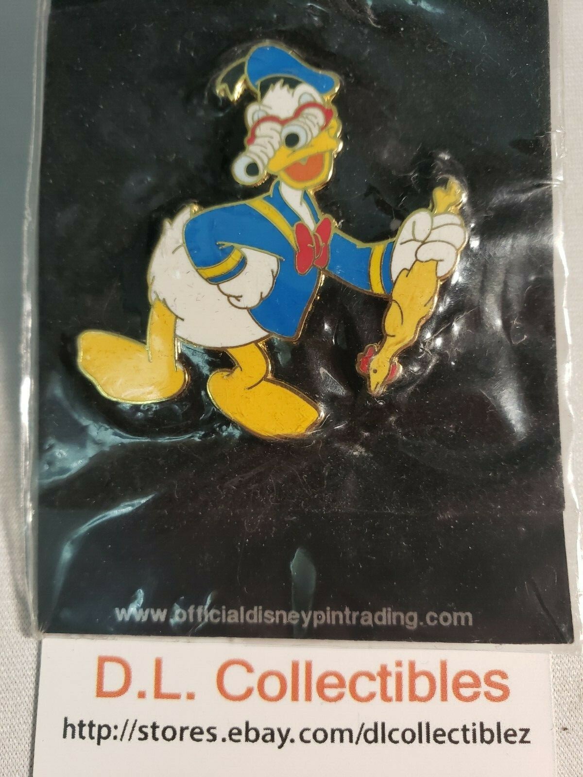 Disney Donald Duck holding rubber chicken google eyes practical jokes ...