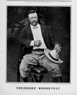 PRESIDENT THEODORE ROOSEVELT SITTING ON HIS CHAIR HOLDING HAT BOOTS ...