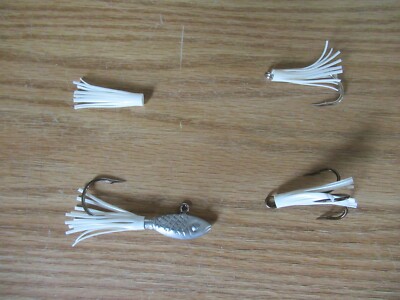 25 WHITE PLASTIC TUBE SLIDING TEASERS COD HADDOCK FLUKE SEA BASS PORGY ...