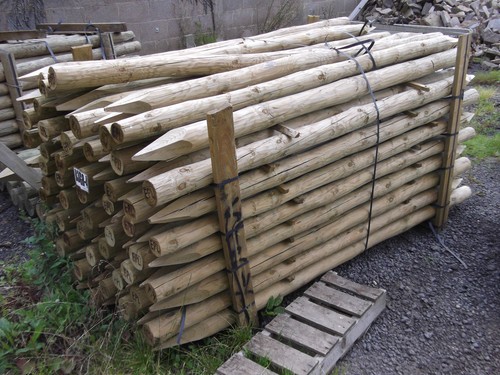 2.4m x 75mm/100mm peeled round pointed post UC4 pressure treated farm ...