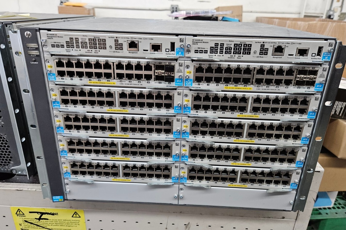 HP J9851A Switch With 2 X J9827A 2 X J9990A 8 X J9986A USED FOR PARTS ...