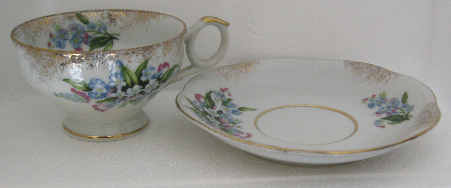 Vintage Forget me not teacup and saucer set handpainted? | eBay