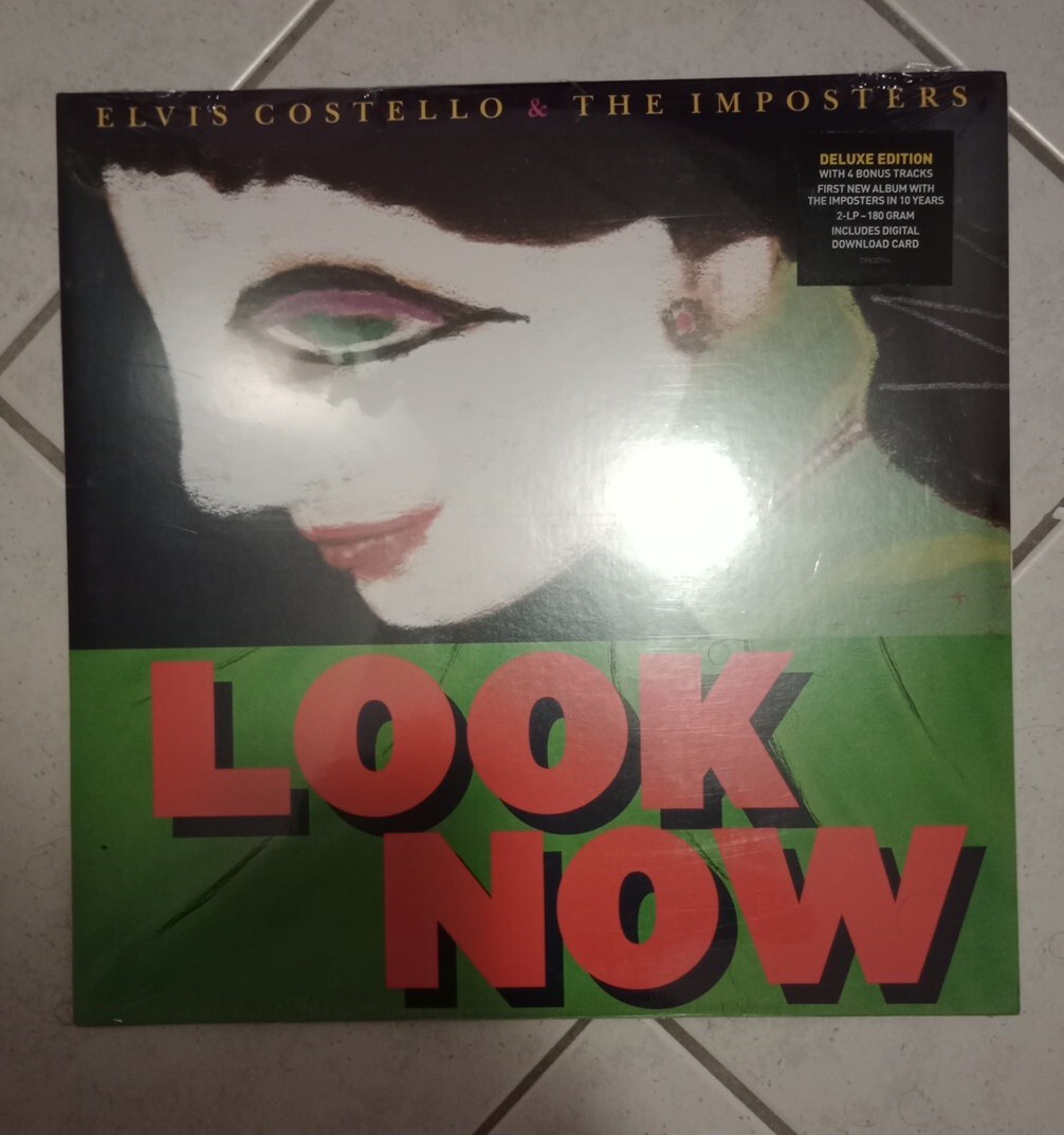 Elvis Costello Returns With Look Now His First Album With