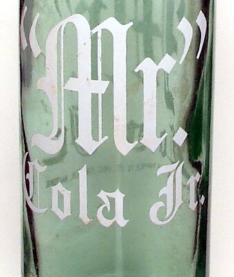 Mr. Cola Jr.; Grapette Co., Inc.; Camden, Ark.; 1-color ACL soda pop ...