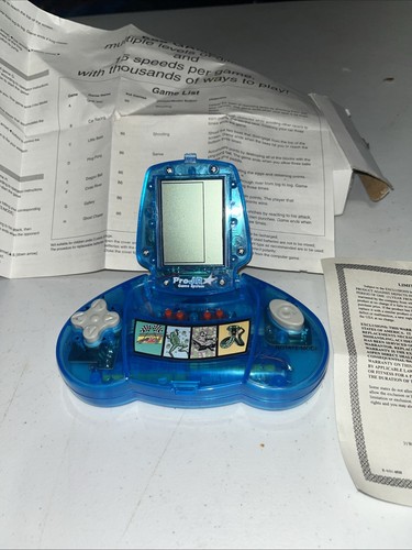 Vintage Pro Jr Handheld Game System clear blue | eBay