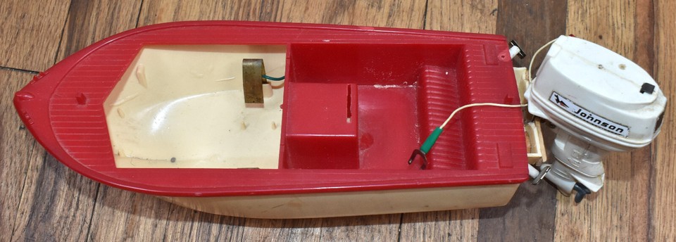 Vintage battery operated toy boat with Johnson Super Seahorse outboard ...