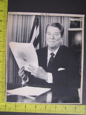 Vtg AP Wire Press Photo President Ronald Reagan Holding His Tax ...