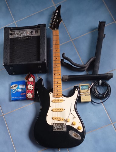 Hondo Electric Guitar Black And White, Legacy Amp, Stand, Tuner, Strap ...