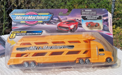 HASBRO MICRO MACHINES MINI VEHICLE HAULER TRUCK PLUS 1 CAR HOLDS 8 CARS ...