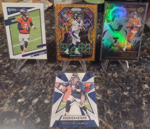 2020-21 Drew Lock (4). Orange Lazer Prizm, Donnruss, Illusions. Broncos ...