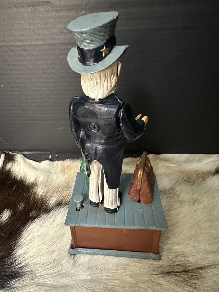 ANTIQUE UNCLE SAM CAST IRON MECHANICAL COIN BANK (The Book Of Knowledge ...