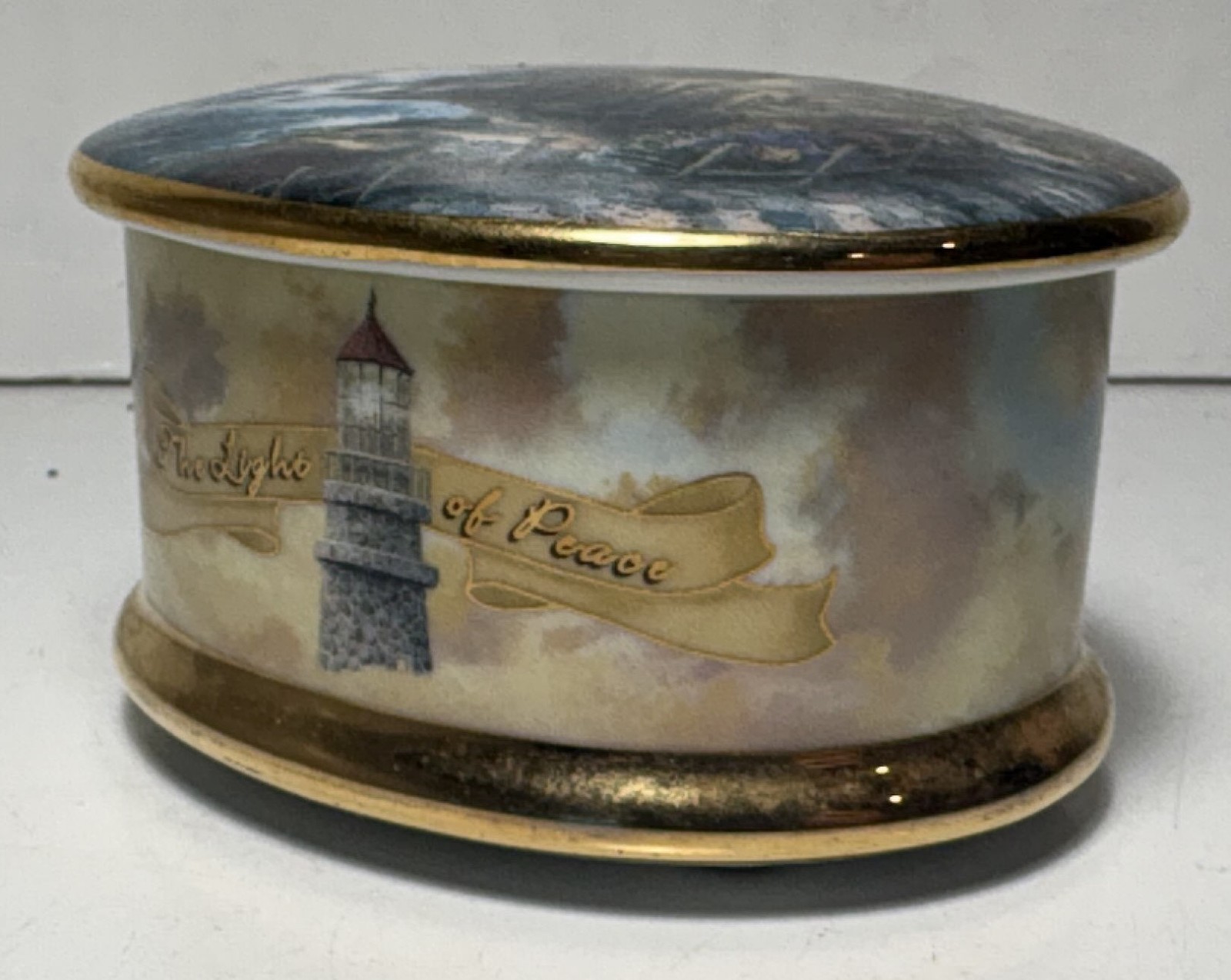 Thomas Kinkade Guiding Lights Music Box Light of Peace Lighthouse ...