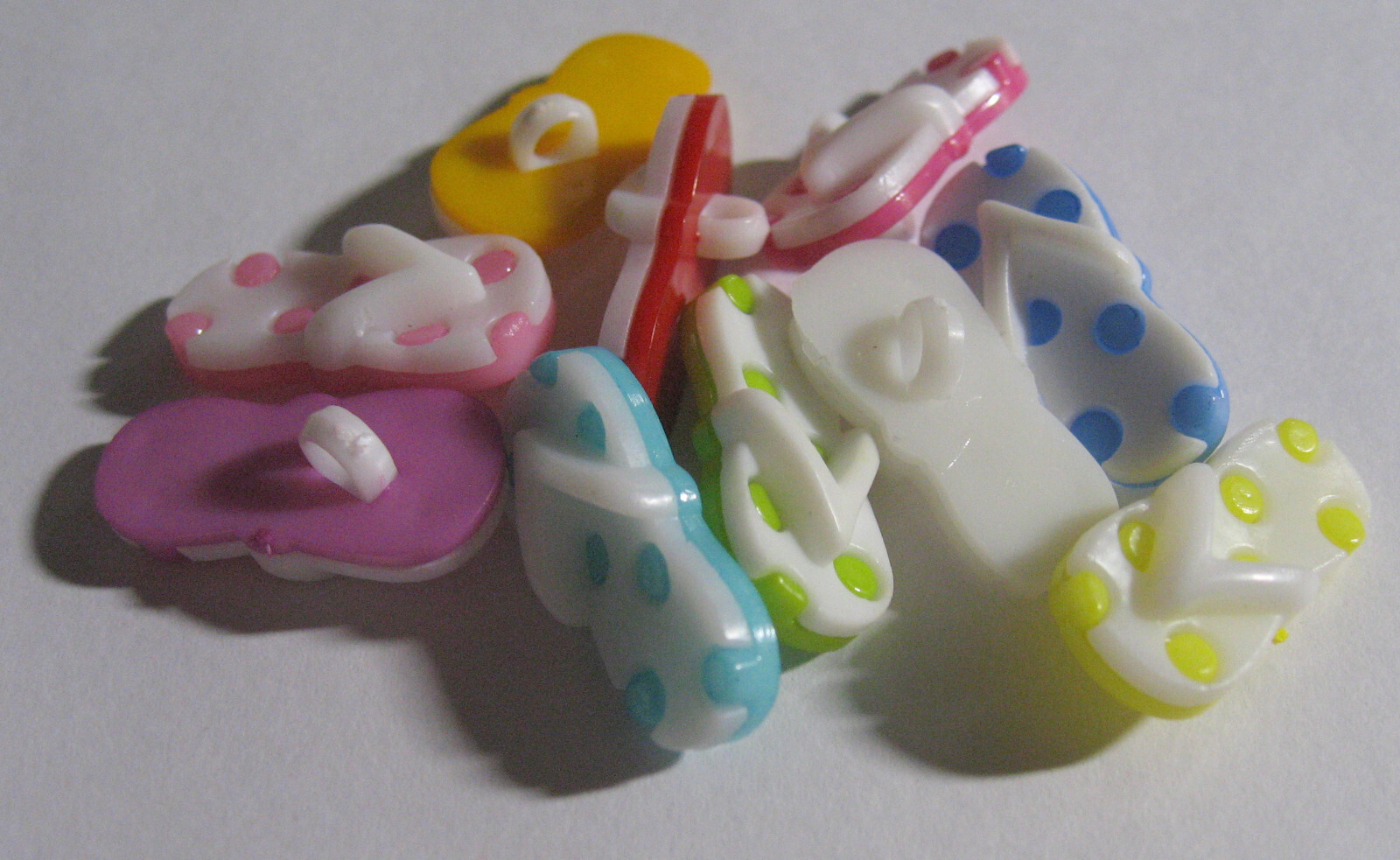 10 Novelty buttons in various shapes sizes and colours: see menu for ...