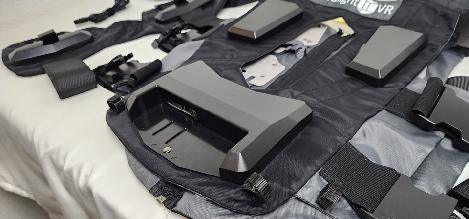 Hardlight VR Suit - Haptic Feedback Motion Tacking Jacket Virtual ...