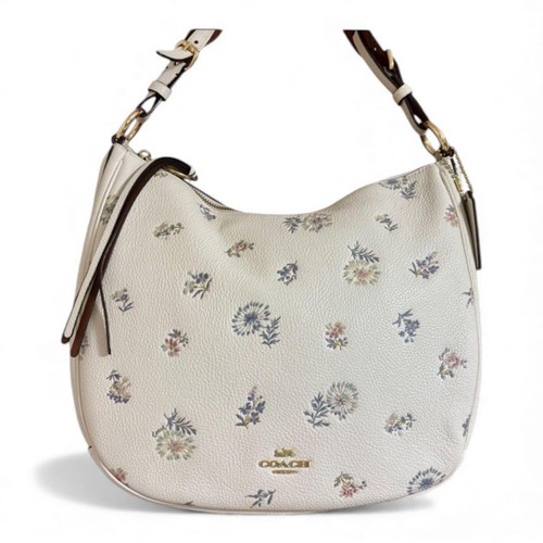Borsa a tracolla Coach Meadow Prairie in pelle lucida con ciottoli ...
