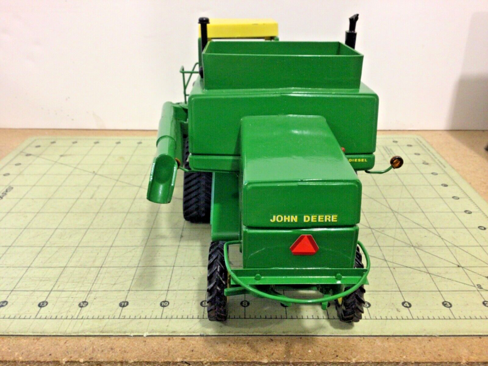 Custom John Deere 6600 combine on tracks with raisable 6 row corn head ...
