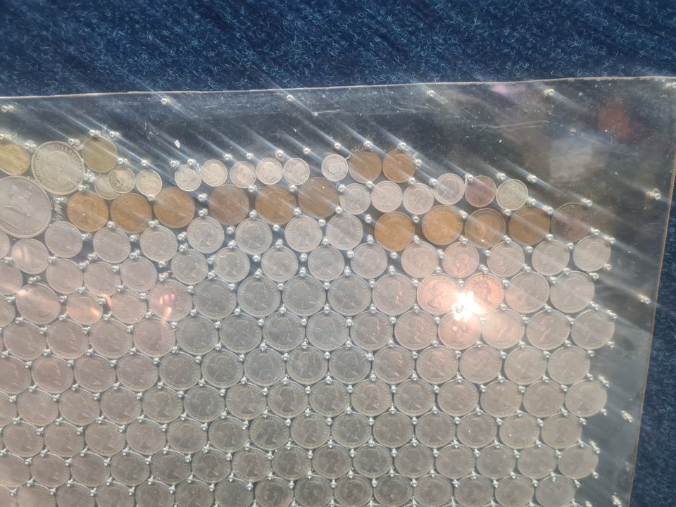 approximately, 675 vintage Coins in unusual Perspex sheet holder ...