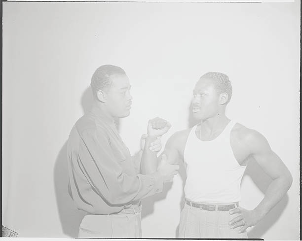 Joe Louis Examining Muscle Of Ezzard Charles 1949 OLD BOXING PHOTO | eBay