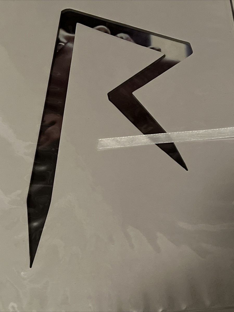 Rihanna R Logo Rihanna Ups Her Fashion Game In These Stunning Neon