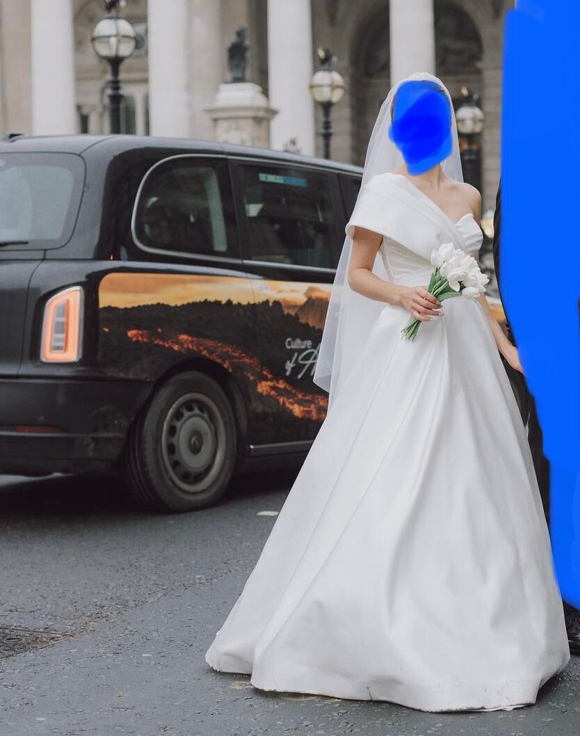 Wedding dress with shoulder veil | Honestweddingadvice.com