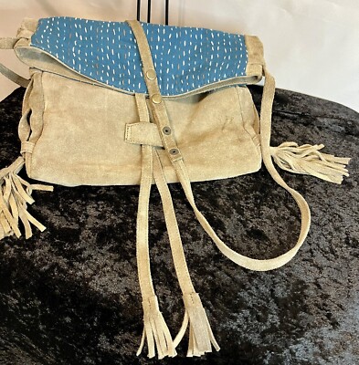 Noonday Collection Suede bag purse .Floral interior pockets. Magnet ...