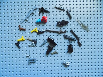 Lego 26 minifig weapons mixed lot brands Guns machine gun pistol rifle ...