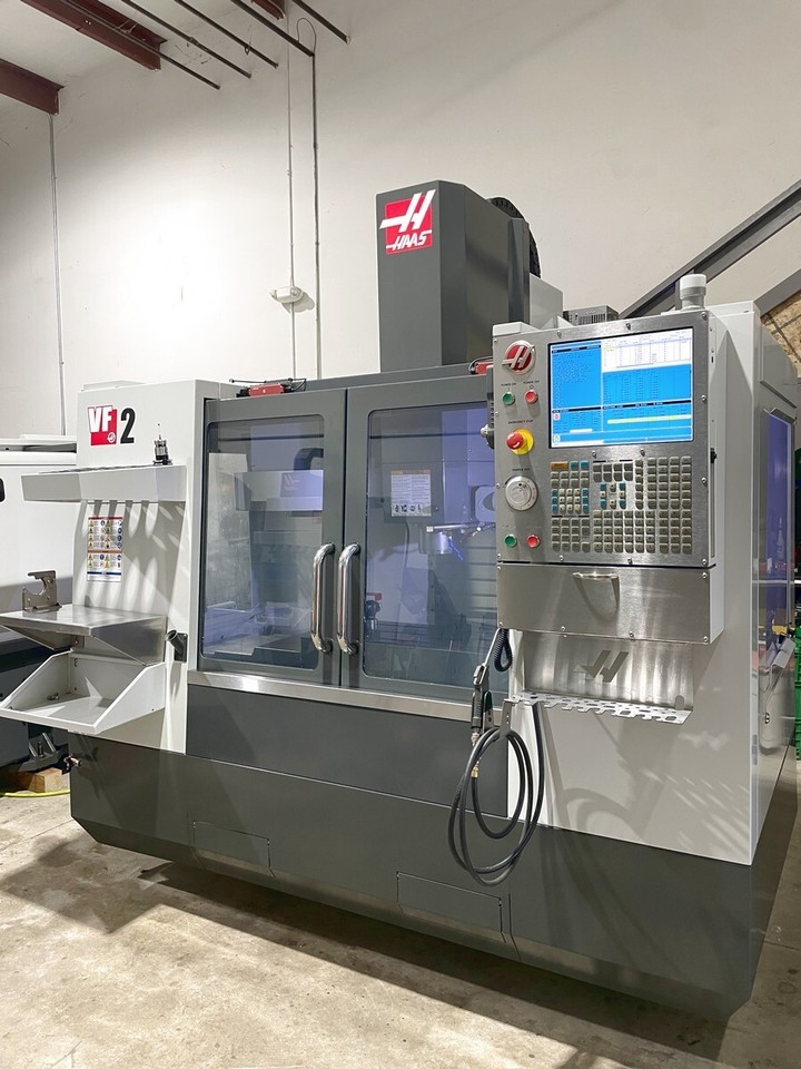 HAAS VF-2 CNC VMC, Probing Systems, Auger, 4th Drive, PCool, Remote Jog ...