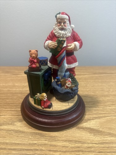 Christmas Holiday Santa Claus Figurine Filling Stockings | eBay