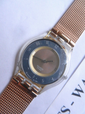 SWATCH+SKIN+SFK240M TRI-GOLD+NEU/NEW | eBay
