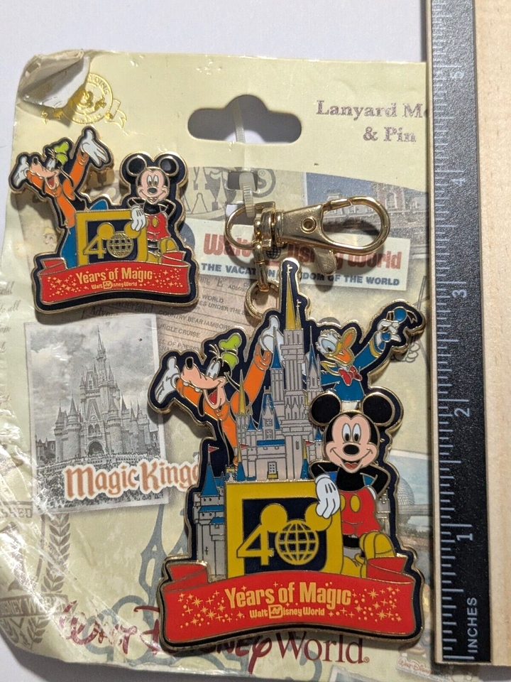 Disney years of magic mickey goofy donald key chain and mickey and ...