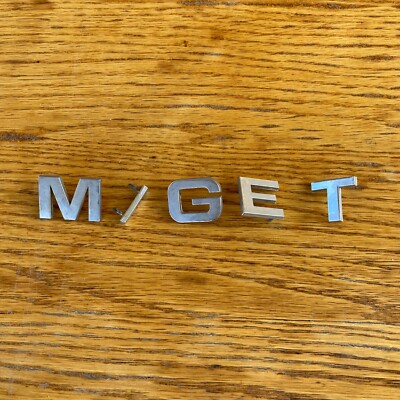 MG Midget emblem 70s letters | eBay