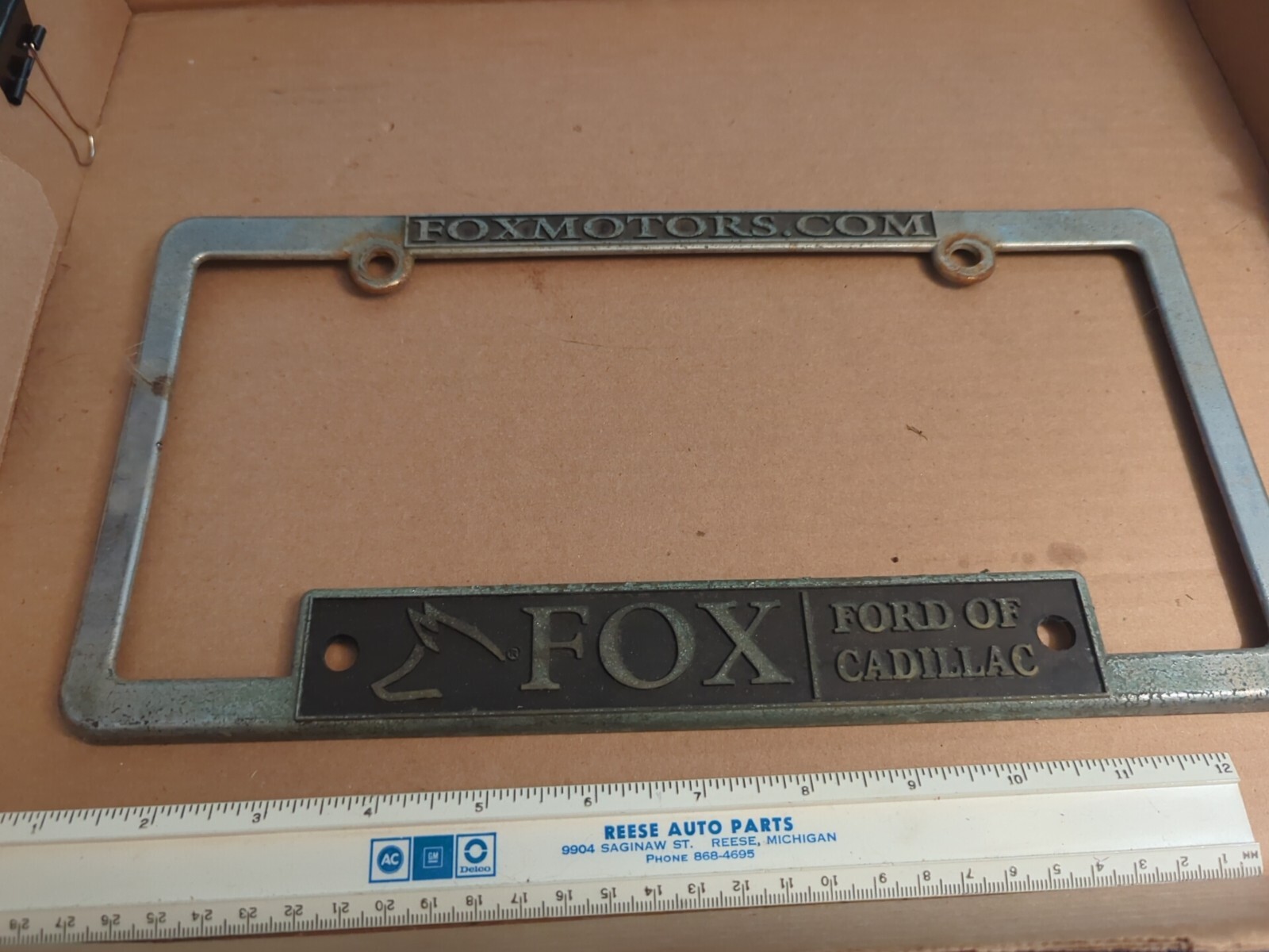 Vintage License plate frame Dealership Fox Ford Of Cadillac Mi 11 | eBay